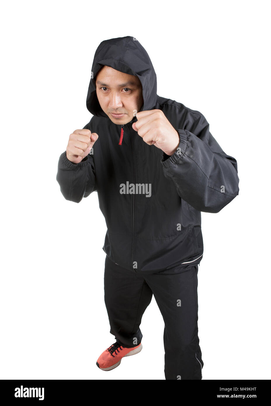 asian boxer man wearing black hood jacket pose boxing acting isolated ...