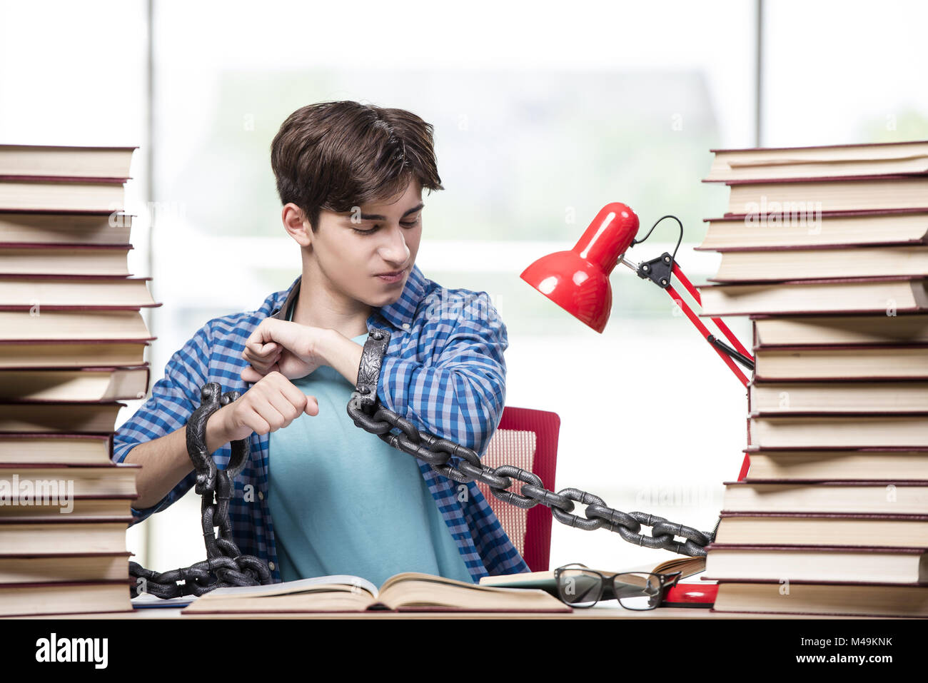 Young man preparing for graduation exams in college Stock Photo - Alamy