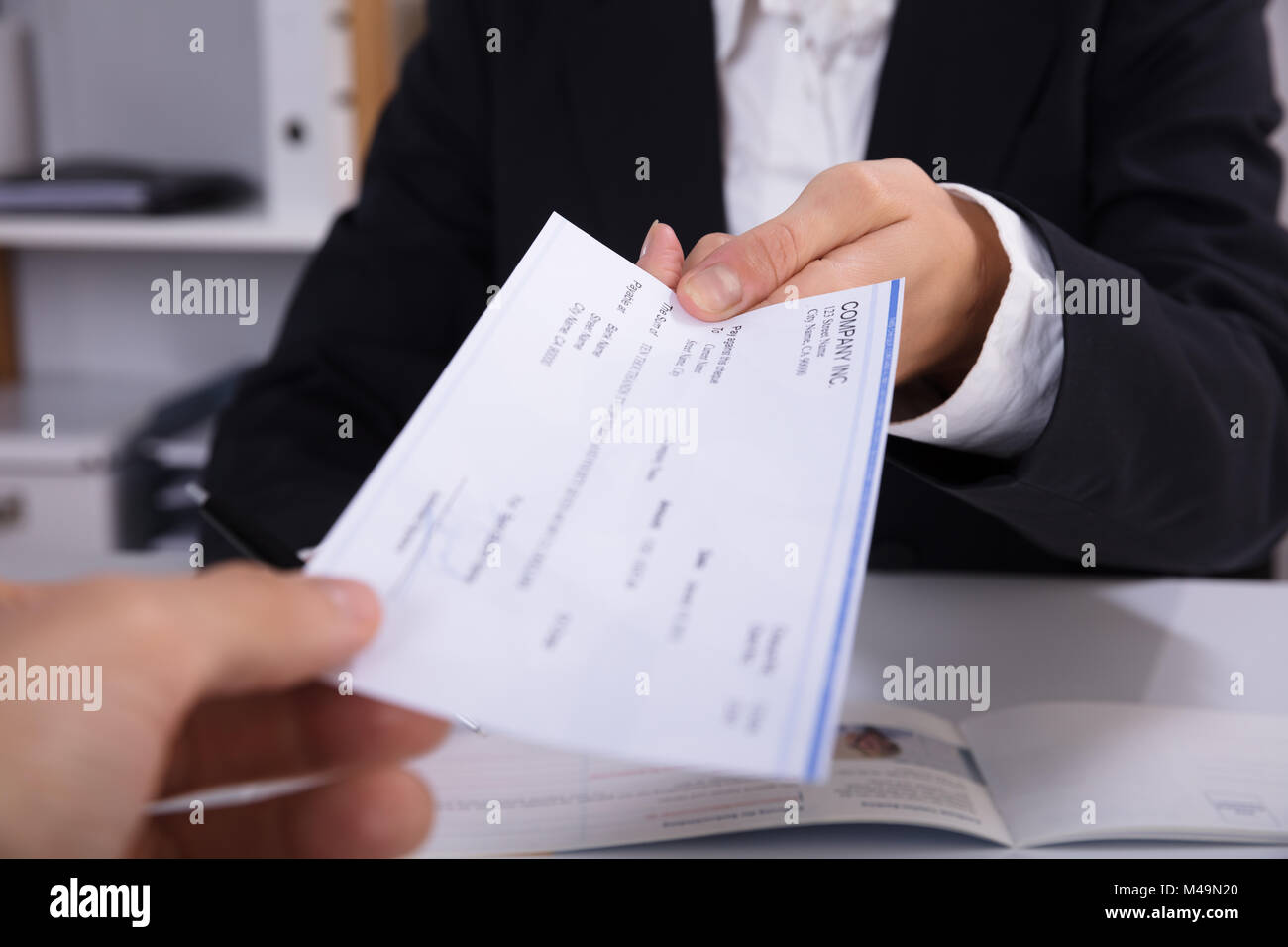 Handing money to bank cashier hi-res stock photography and images - Alamy