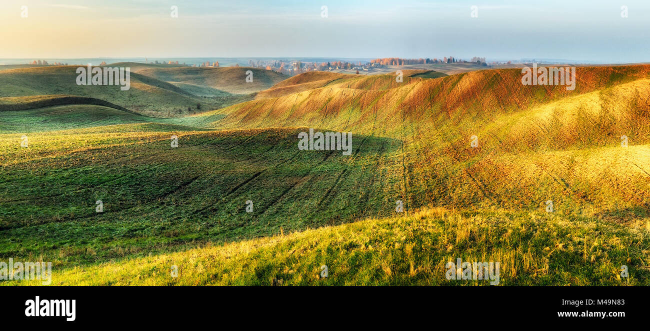autumn field. picturesque hilly field Stock Photo - Alamy