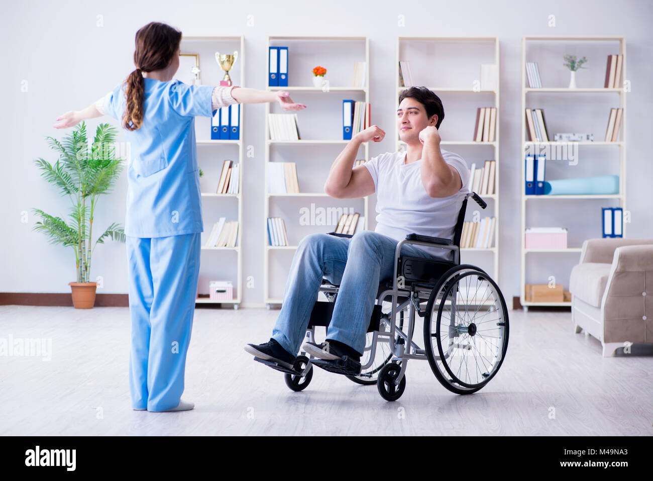 Patient undergoing rehabilitation recovery programme with doctor Stock ...