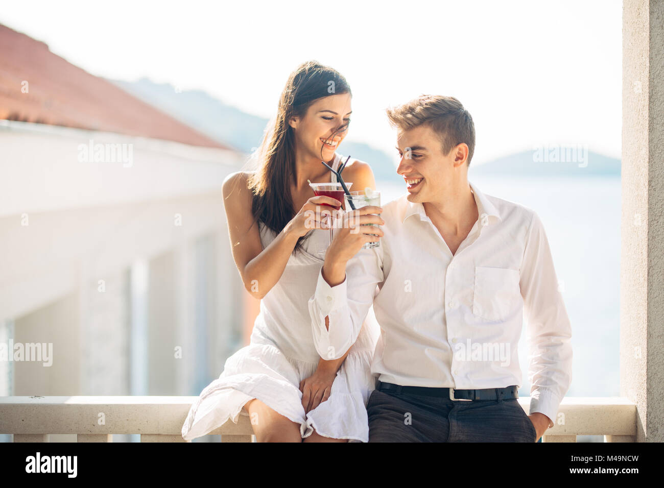 Intimate swimming couple romance hi-res stock photography and images ...