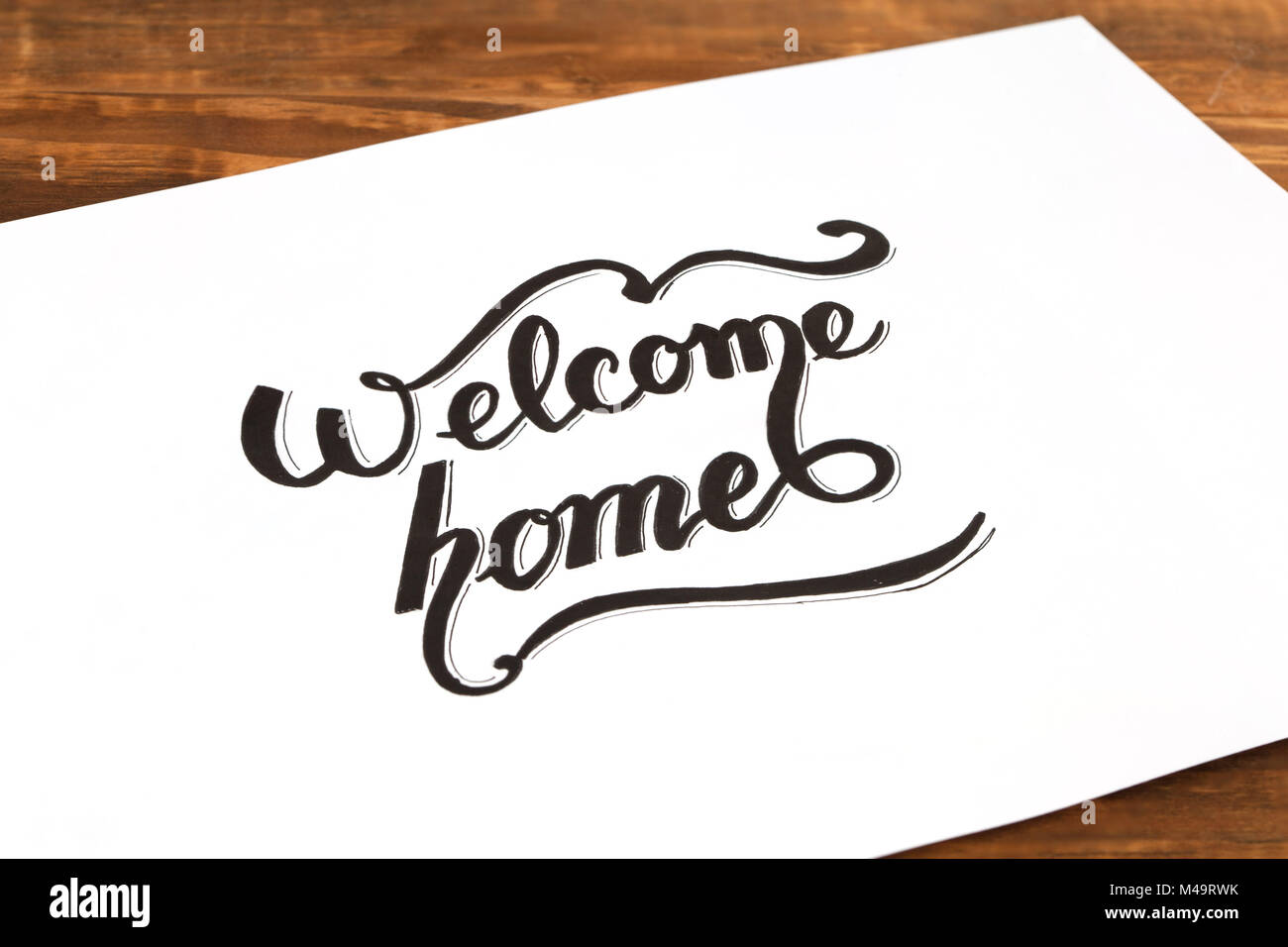 Welcome Home - elegant calligraphy lettering Stock Photo - Alamy