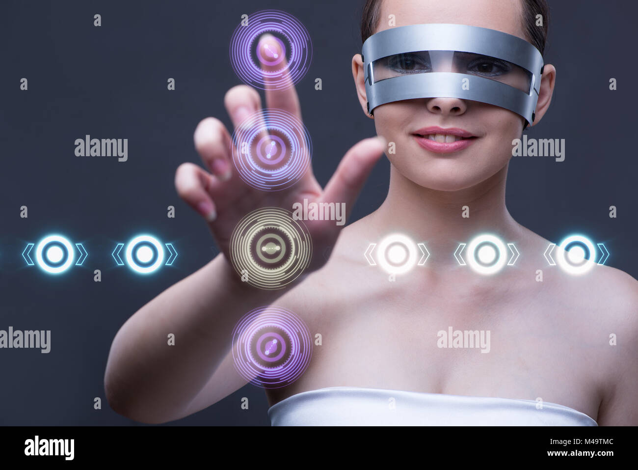Techno girl pressing virtual buttons Stock Photo - Alamy
