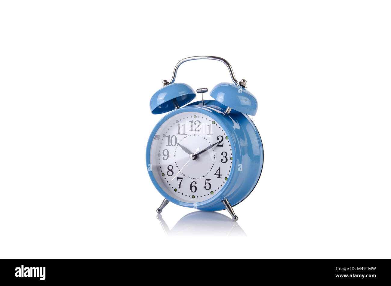 Alarm clock in time concept isolated on white Stock Photo - Alamy