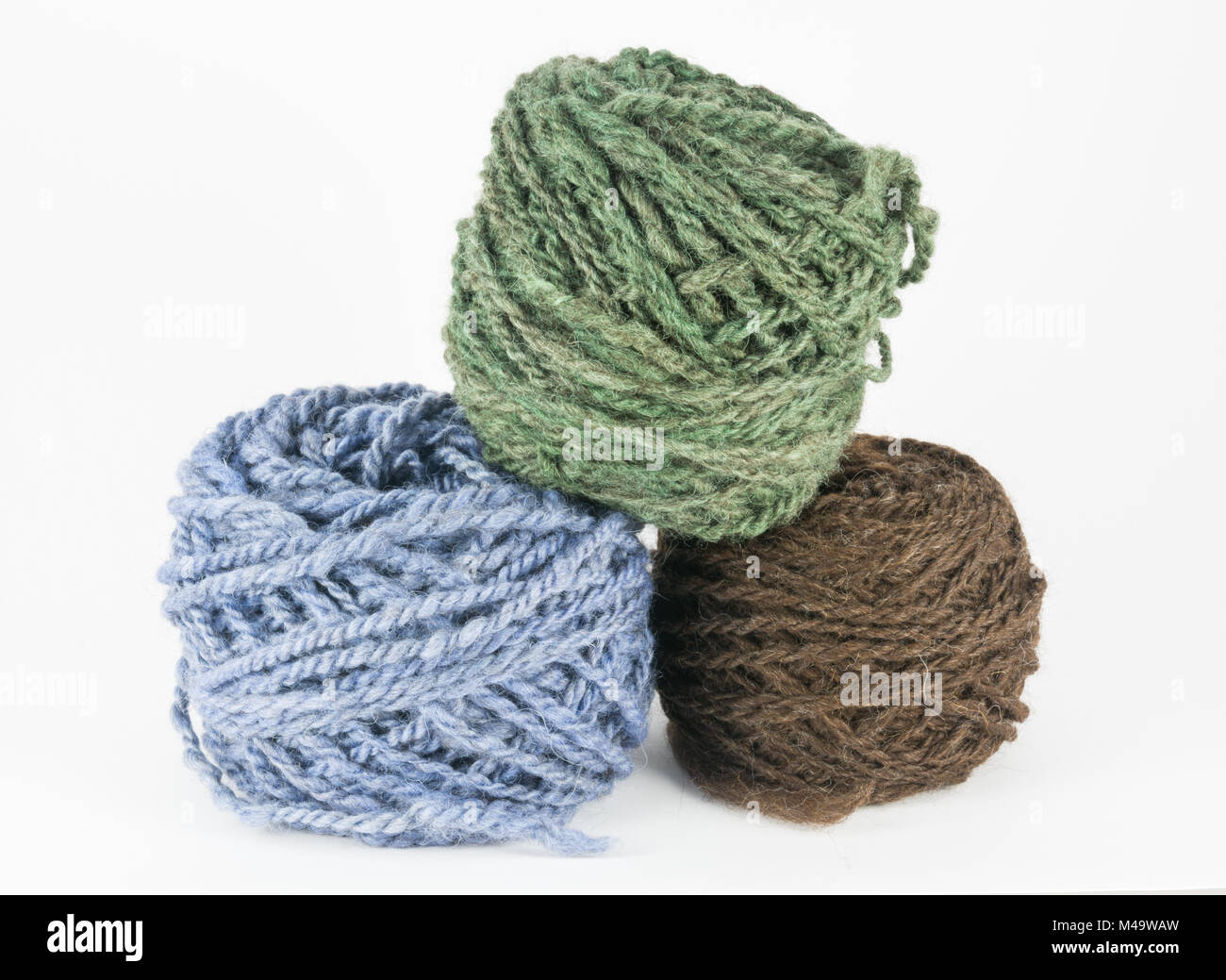 Balls of wool on a white background Stock Photo - Alamy