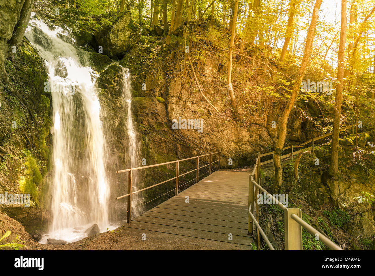 Bridge over waterfall hi-res stock photography and images - Alamy