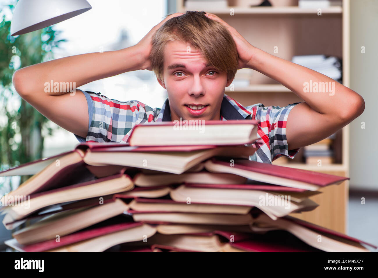 Young man student preparing for college exams Stock Photo - Alamy