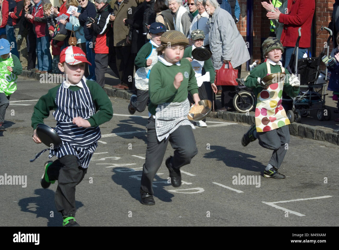 Childrens pancake race hi-res stock photography and images - Alamy