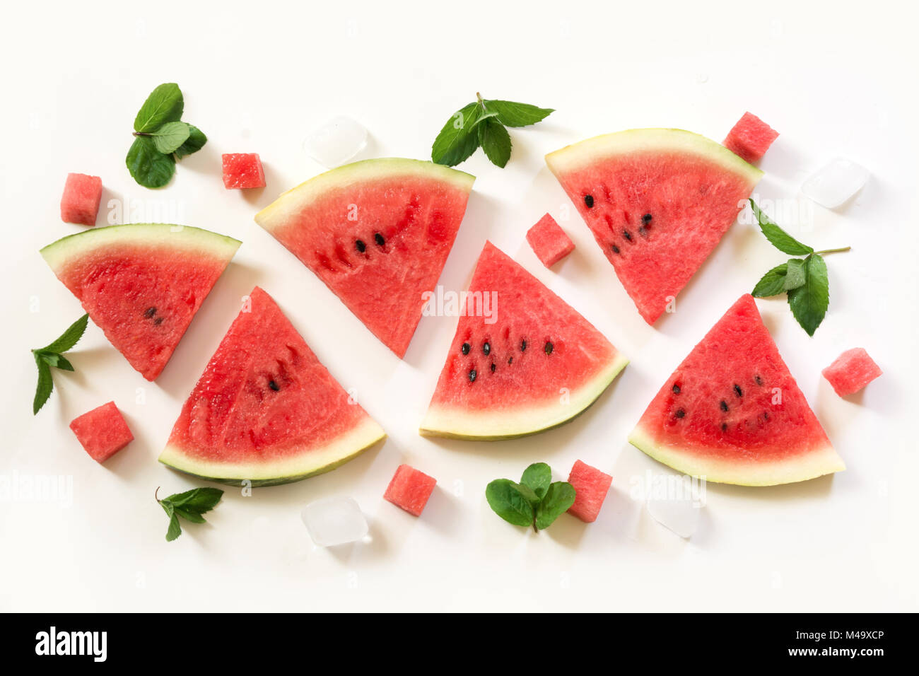 Slice of watermelon, mint ice on a white background. Top view Stock ...