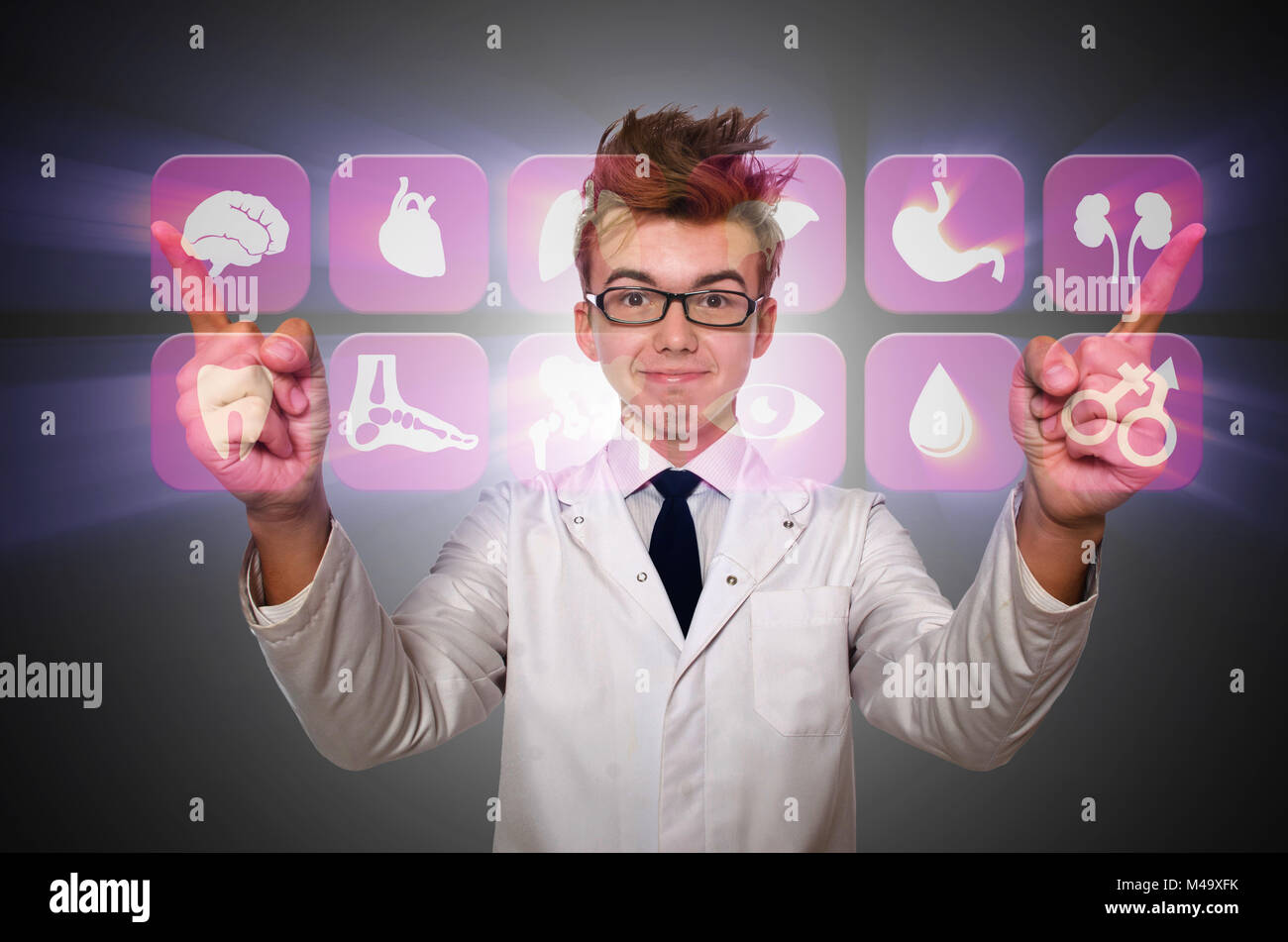 Man doctor pressing buttons with various medical icons Stock Photo - Alamy