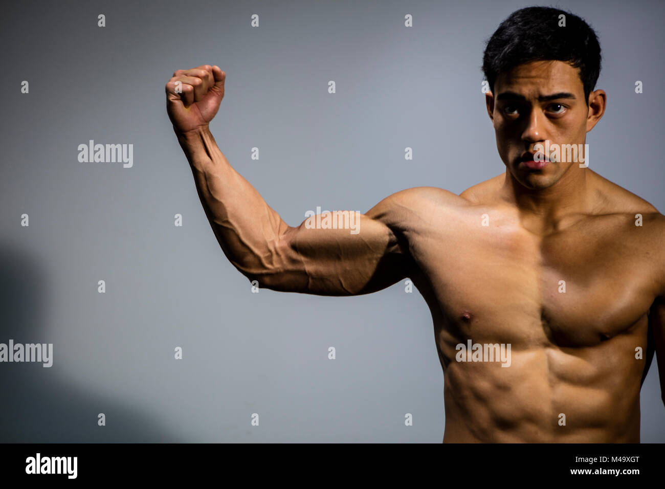 Man Pecs Muscles High Resolution Stock Photography and Images - Alamy