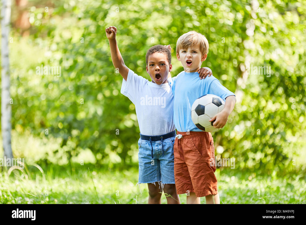 Soccer children cheering african hi-res stock photography and images ...