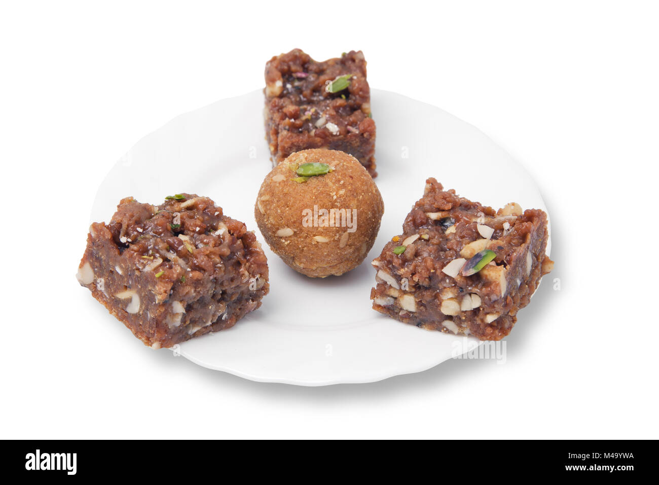 Indian sweets on a plate Stock Photo - Alamy