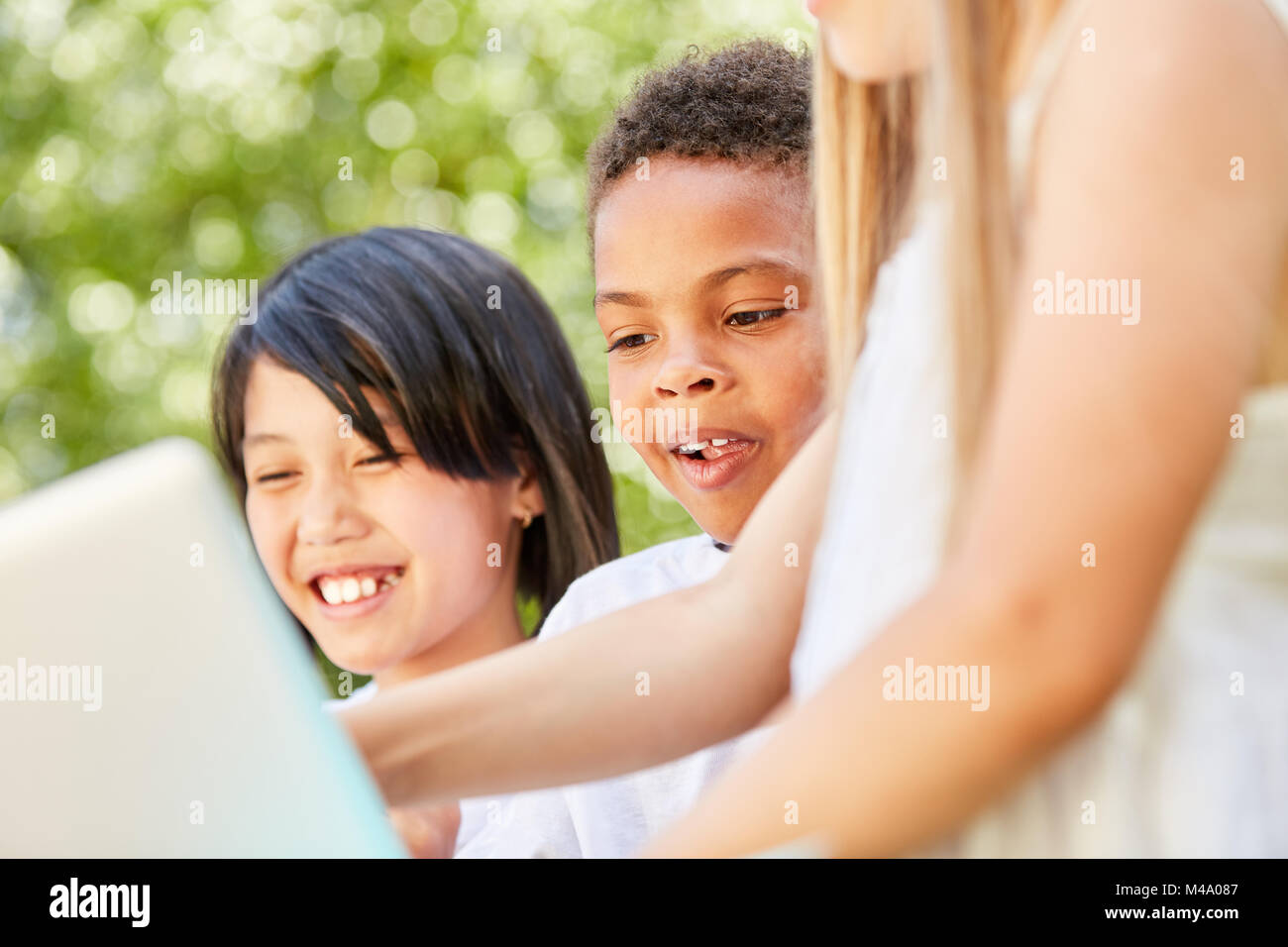 Kids at Laptop Computers have fun chatting in social media Stock Photo ...