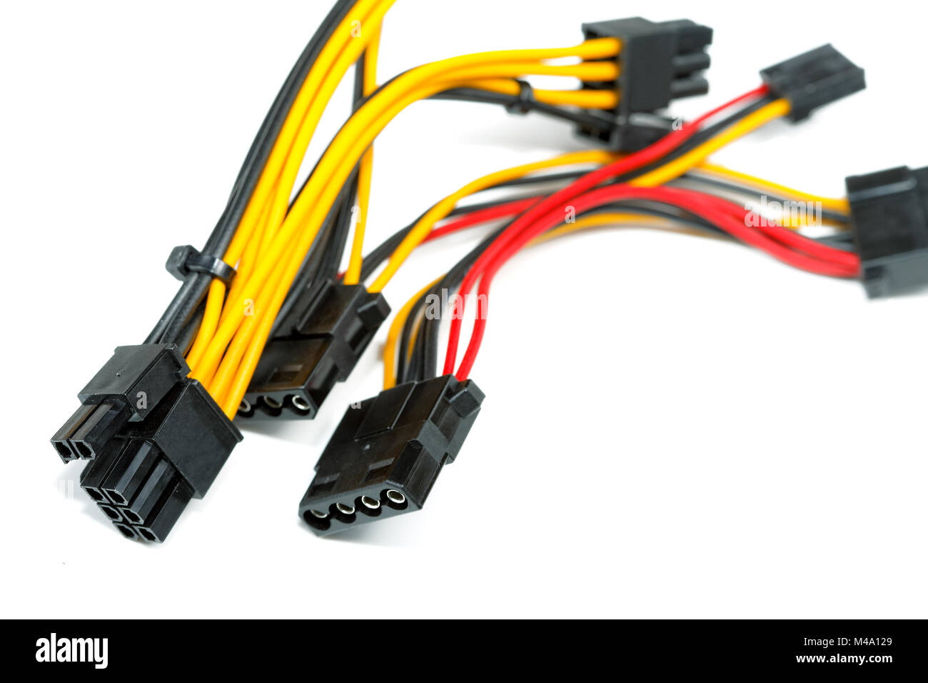 connecting wires to a computer on a white background Stock Photo - Alamy