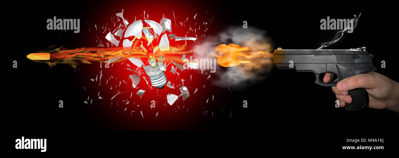 the gun shoots at the bulb with a bullet Stock Photo - Alamy
