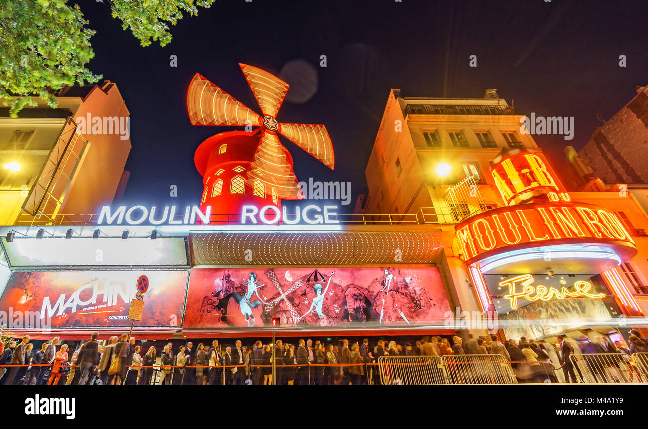 PARIS - MAY 15: The Moulin Rouge blurred motion by night, on May 15 ...