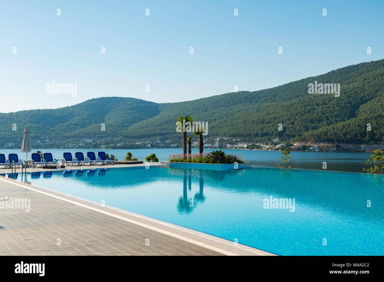 Nice swimming pool outdoors on bright summer day Stock Photo - Alamy