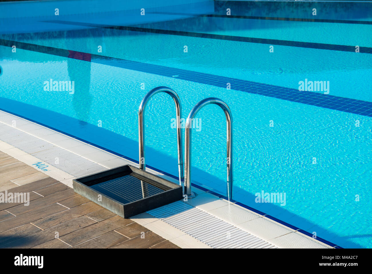 Nice swimming pool outdoors on bright summer day Stock Photo - Alamy