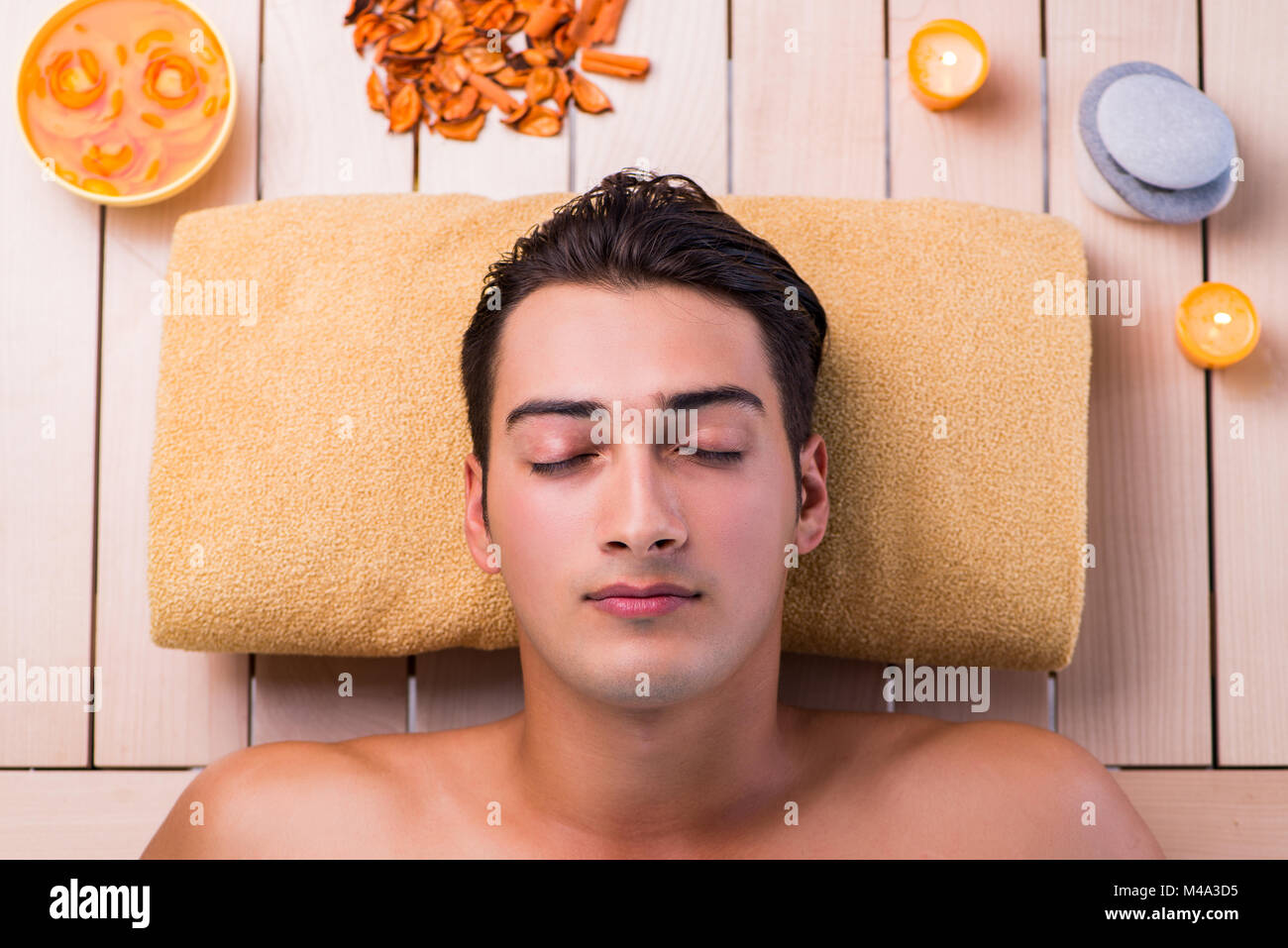 Handsome man during spa session Stock Photo - Alamy