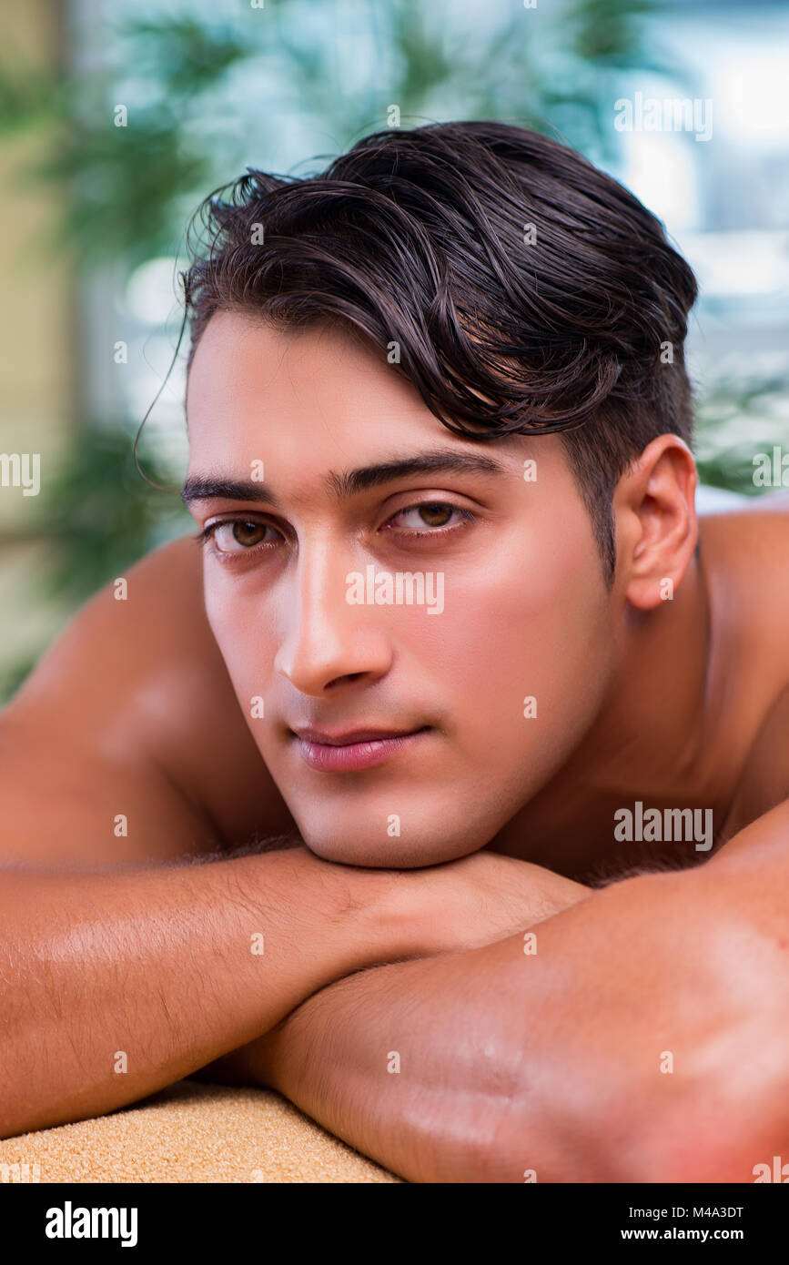Handsome man during spa session Stock Photo - Alamy