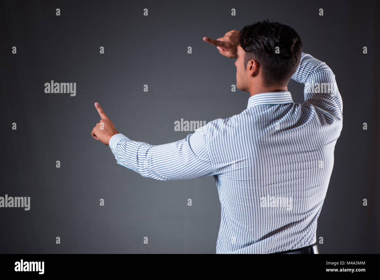 Handsome businessman pressing virtual buttons Stock Photo - Alamy Handsome businessman pressing virtual buttons Stock Photo - Alamy