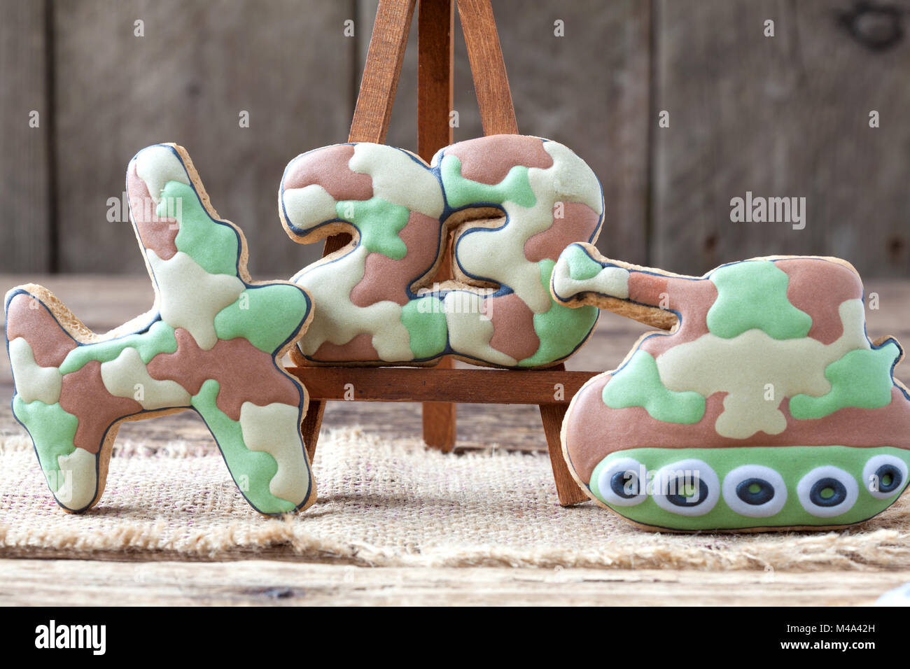 Homemade Gingerbreads in the form of a grenade, a tank, fighter ...