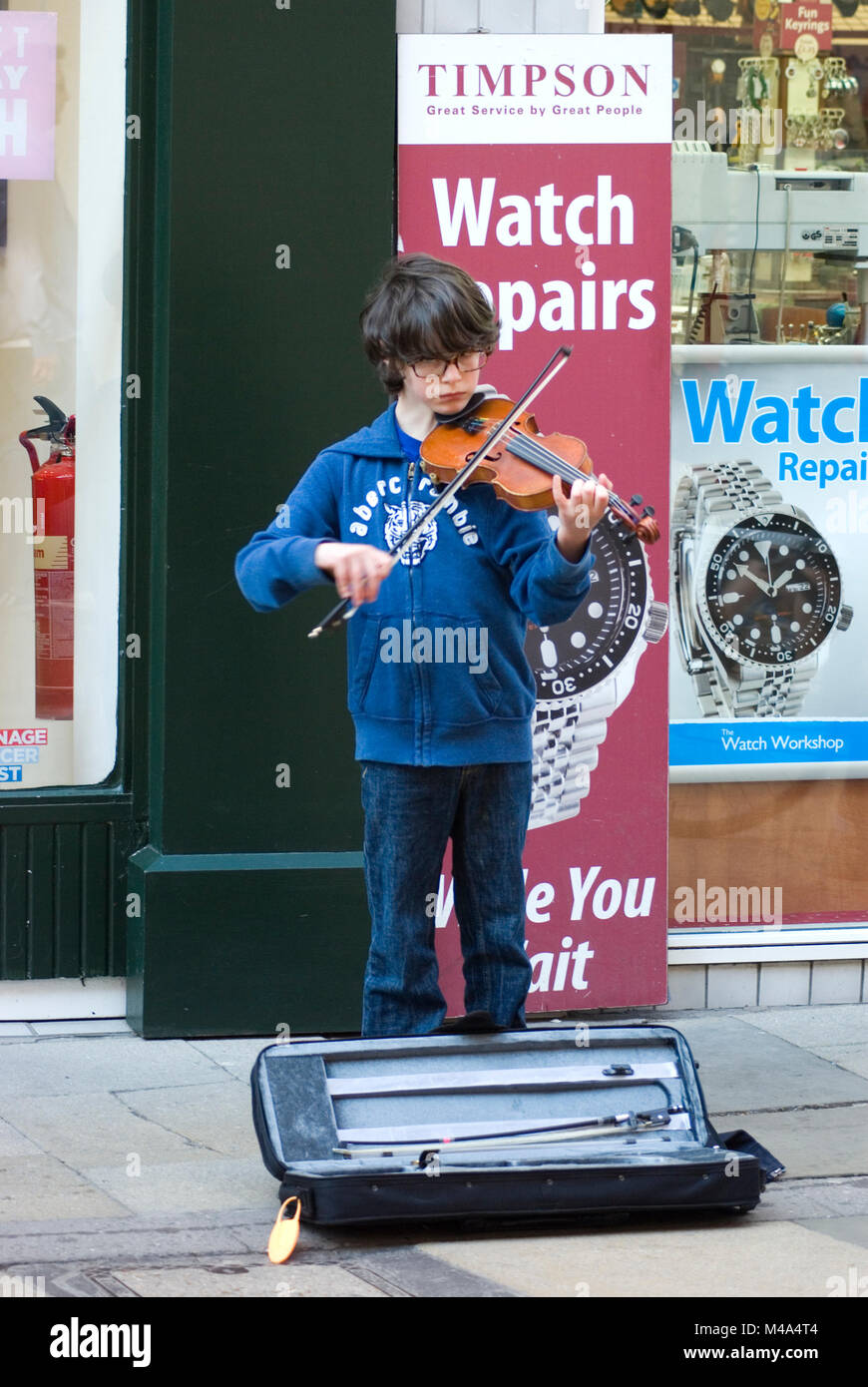 Young Boy Busking Stock Photo - Alamy