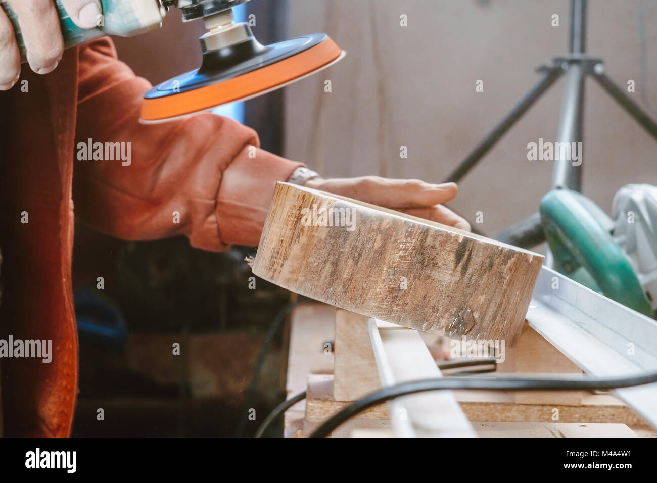 Worker grinds wood grinding hi-res stock photography and images - Alamy