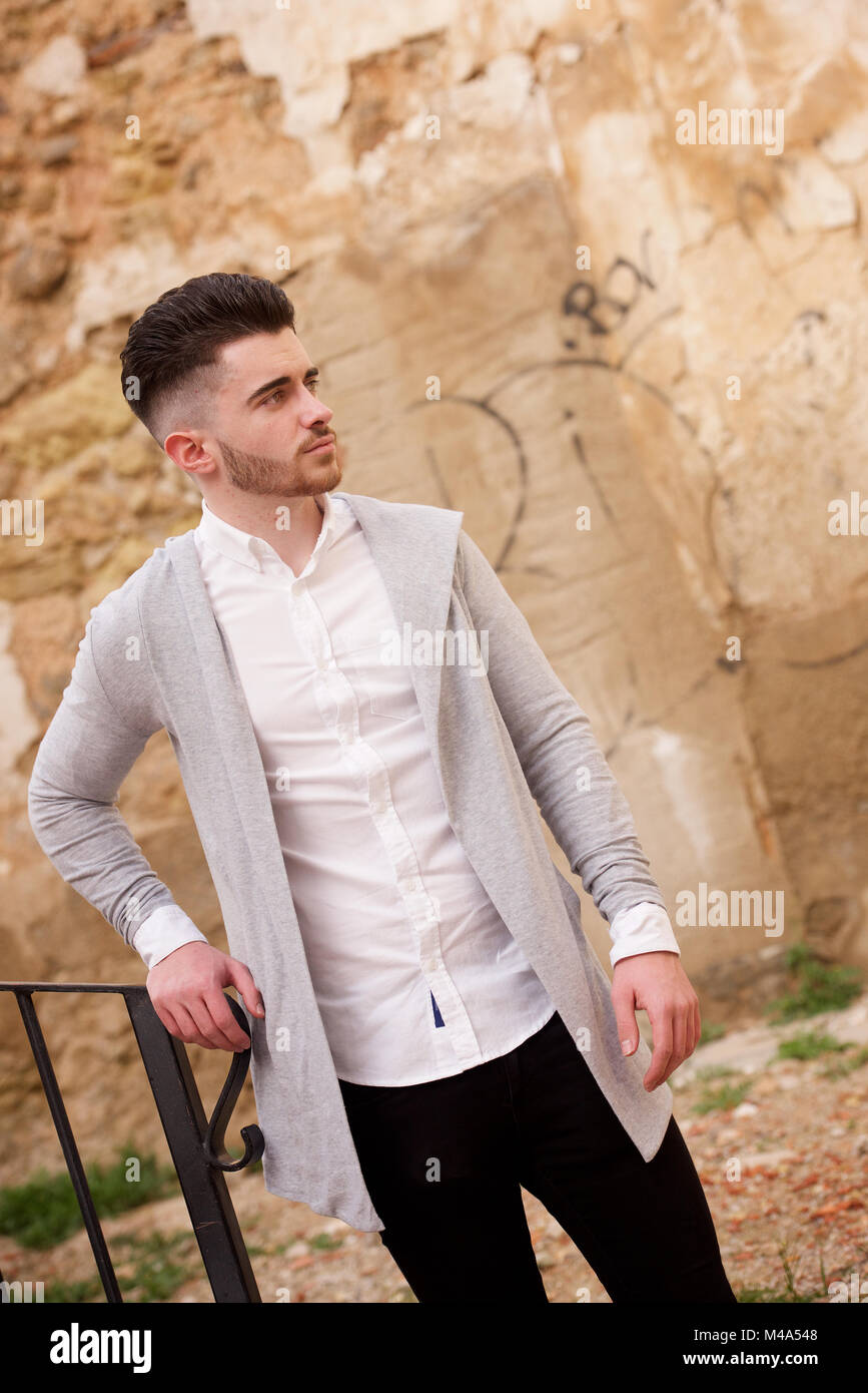 Young man - fashion style on the street location Stock Photo - Alamy