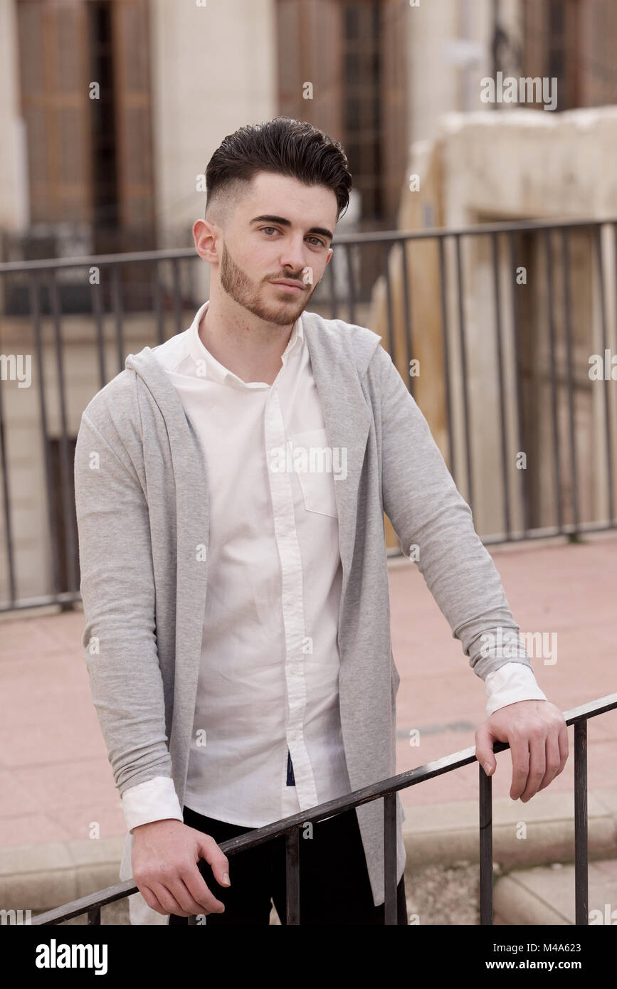 Young man - fashion style on the street location Stock Photo - Alamy