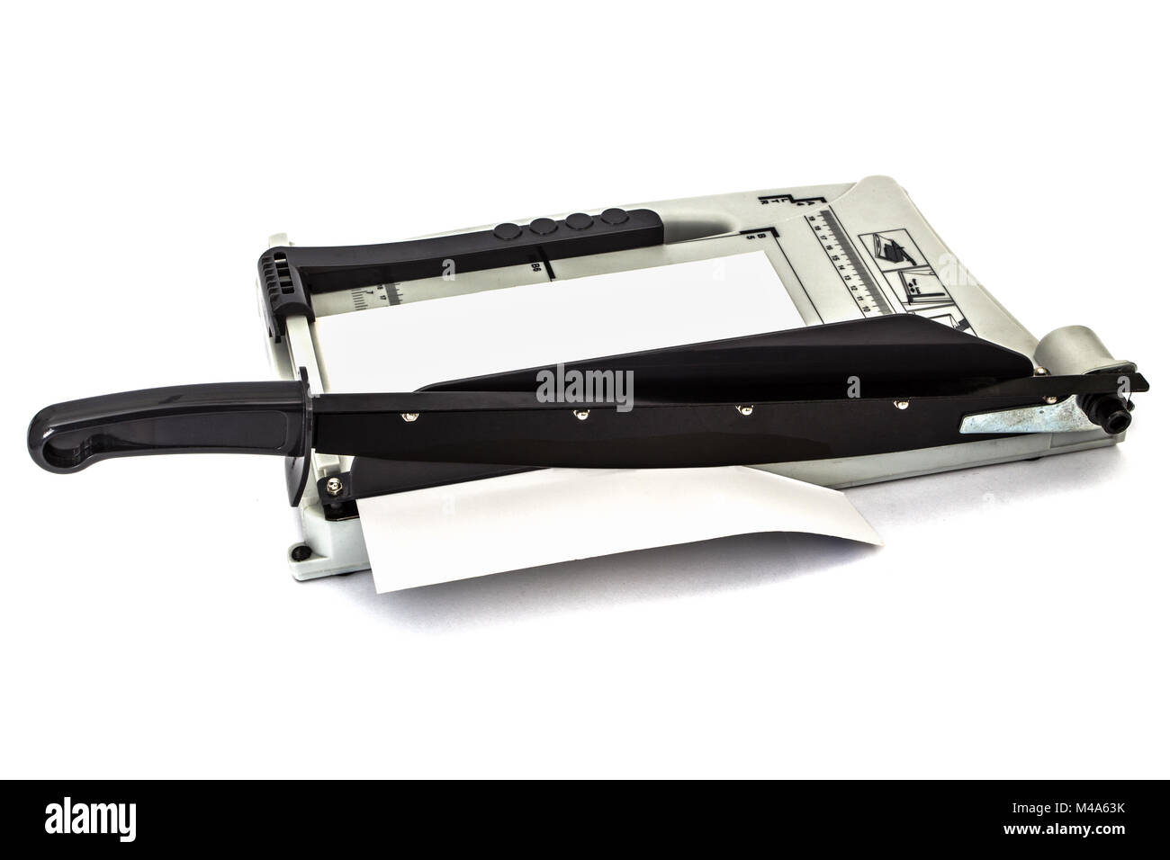 Cutter for a paper, isolated on white background Stock Photo - Alamy