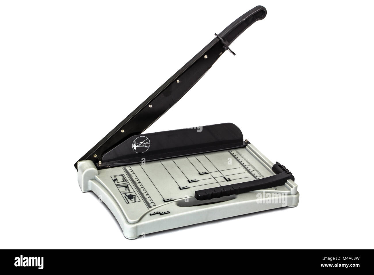 Cutter for a paper, isolated on white background Stock Photo - Alamy