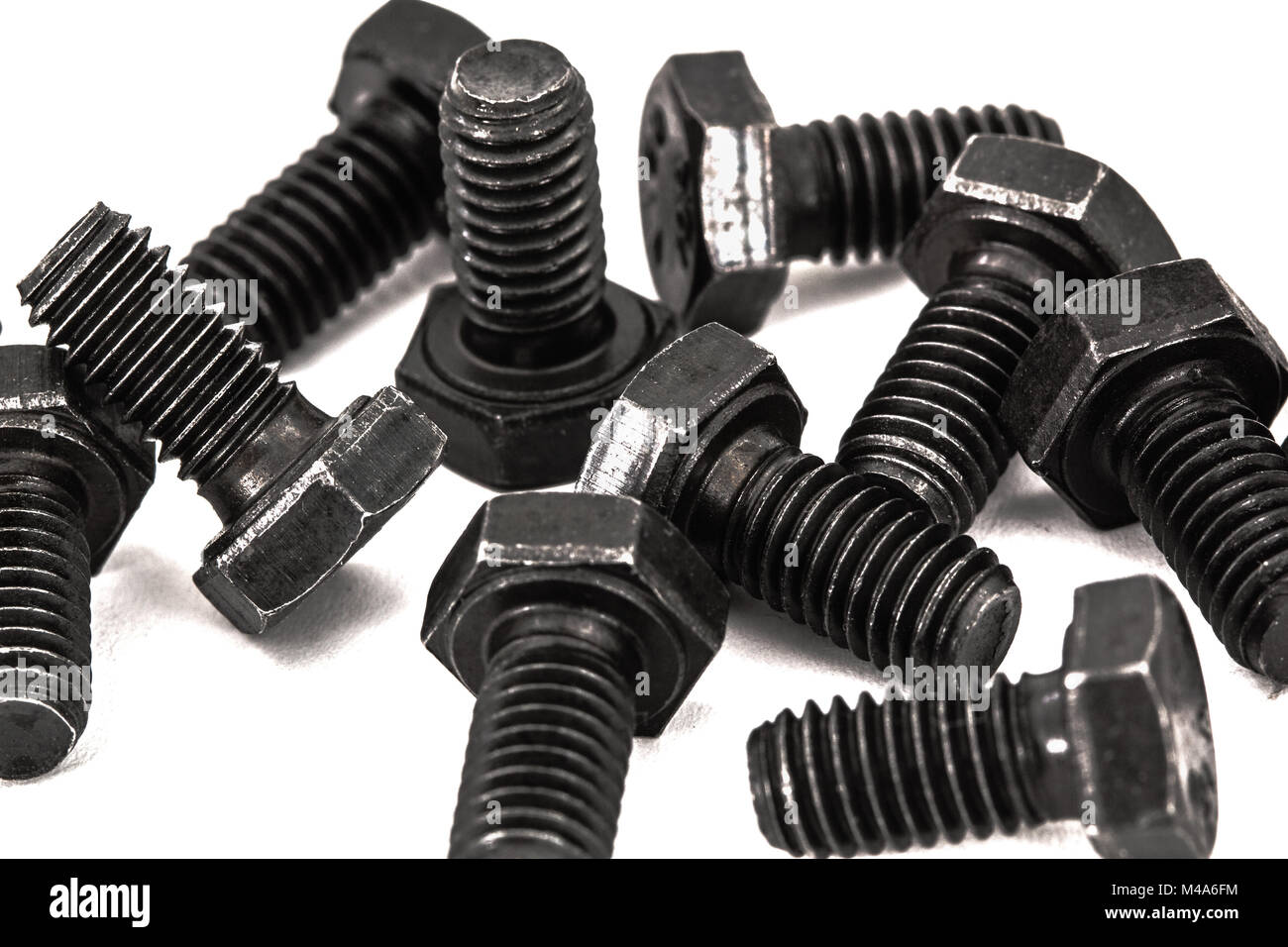 Hardened screws, isolated on white background Stock Photo - Alamy