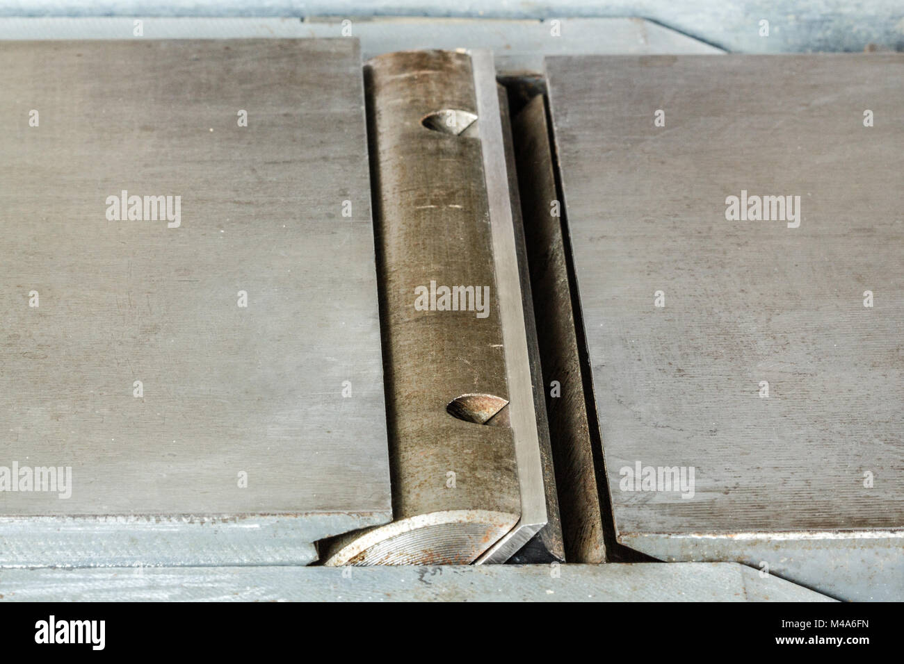 Shaft with sharp knives of woodworking jointer Stock Photo - Alamy