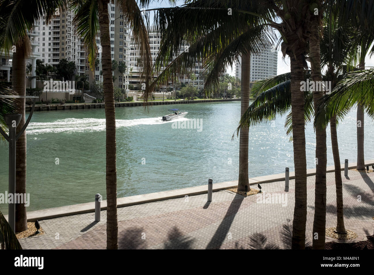 Boat cruising along the waterfront in downtown Brickell, Miami, Florida ...