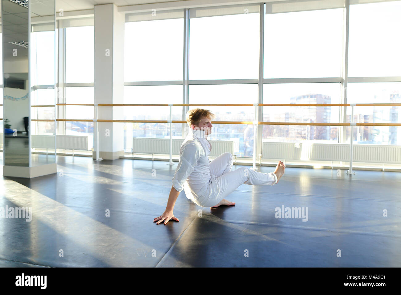 Male dancer moves using street style elements Stock Photo - Alamy