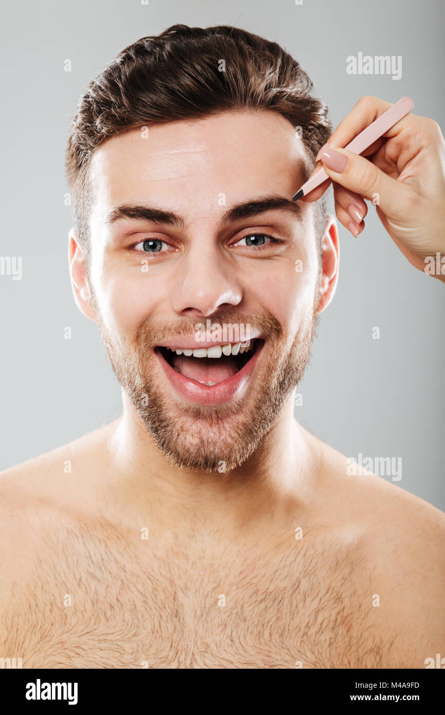 Man And Plucking Eyebrows High Resolution Stock Photography and Images ...