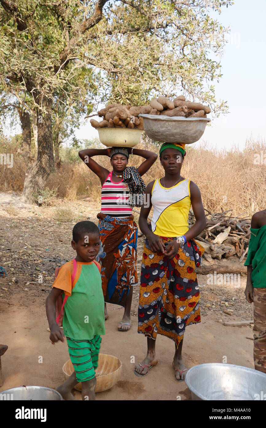 Women with yam food Stock Photo - Alamy