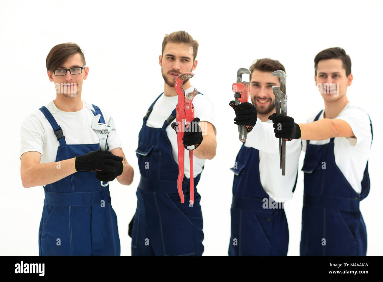 group of construction workers with working tools Stock Photo - Alamy