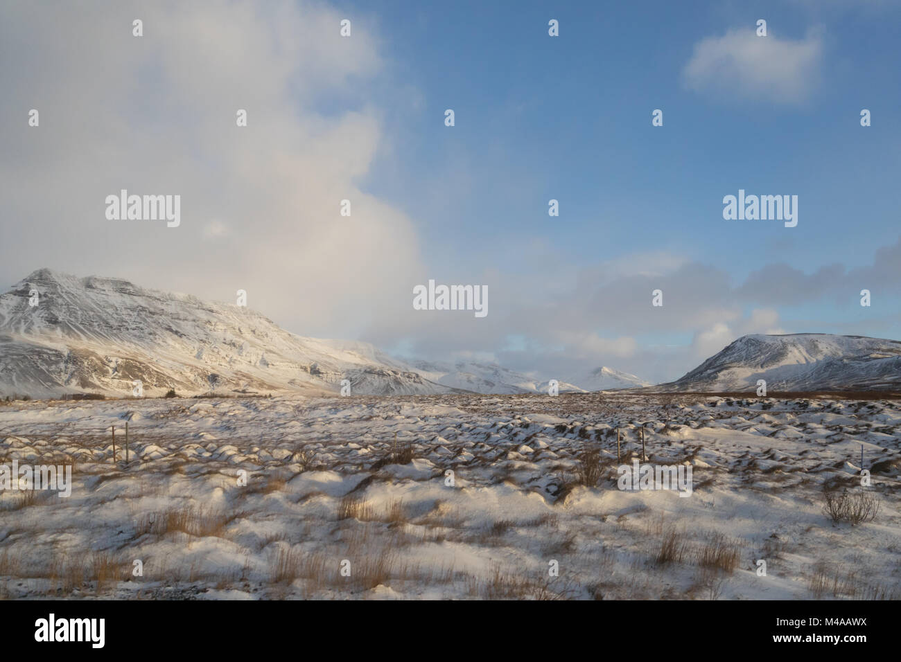 Snowy winter landscape in western Iceland with sunny sky Stock Photo ...