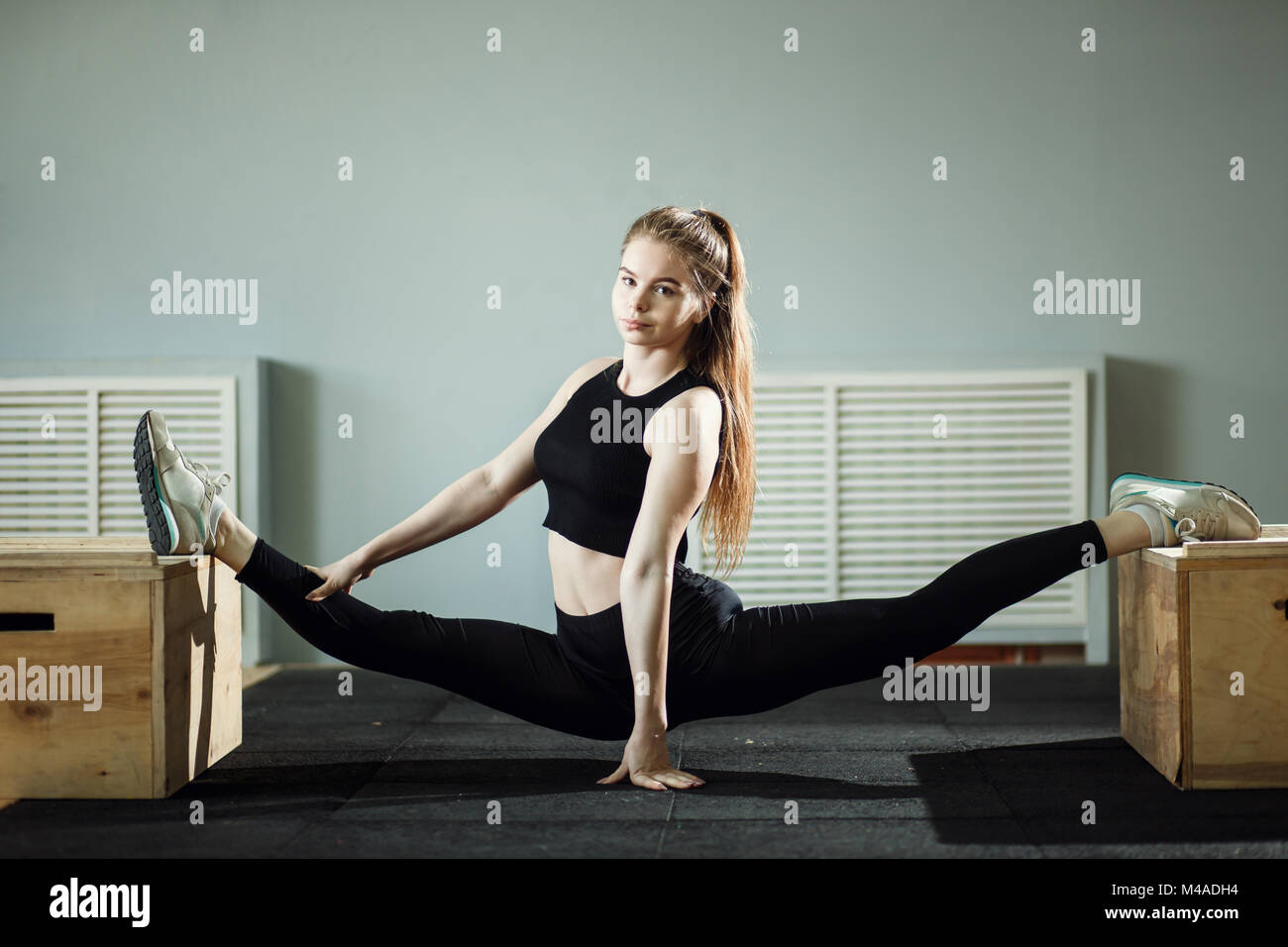 Young yogi attractive woman practicing yoga concept, doing advanced ...