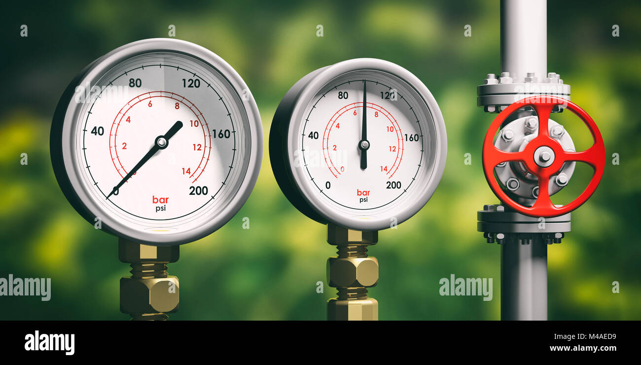 Industrial high pressure gas manometers, pipelines and valves on blur ...