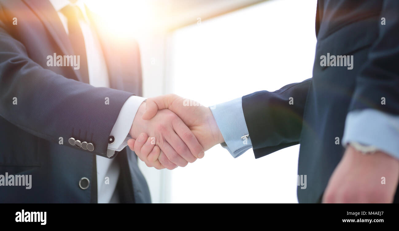 closeup. handshake business partners after bargain Stock Photo - Alamy