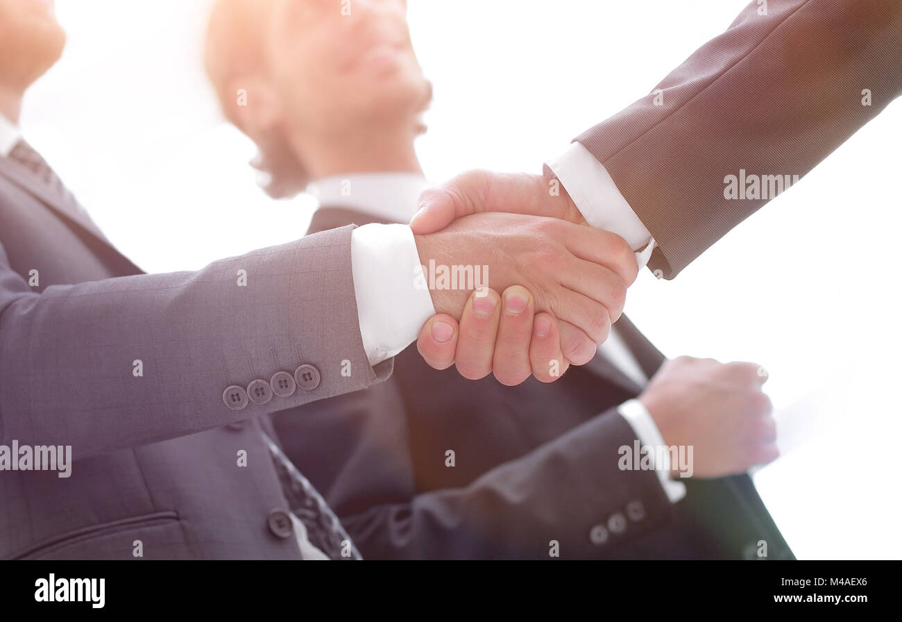 Cropped image of business people shaking hands Stock Photo - Alamy