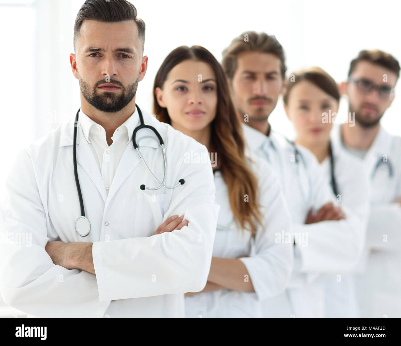 Portrait of medical team standing together Stock Photo - Alamy