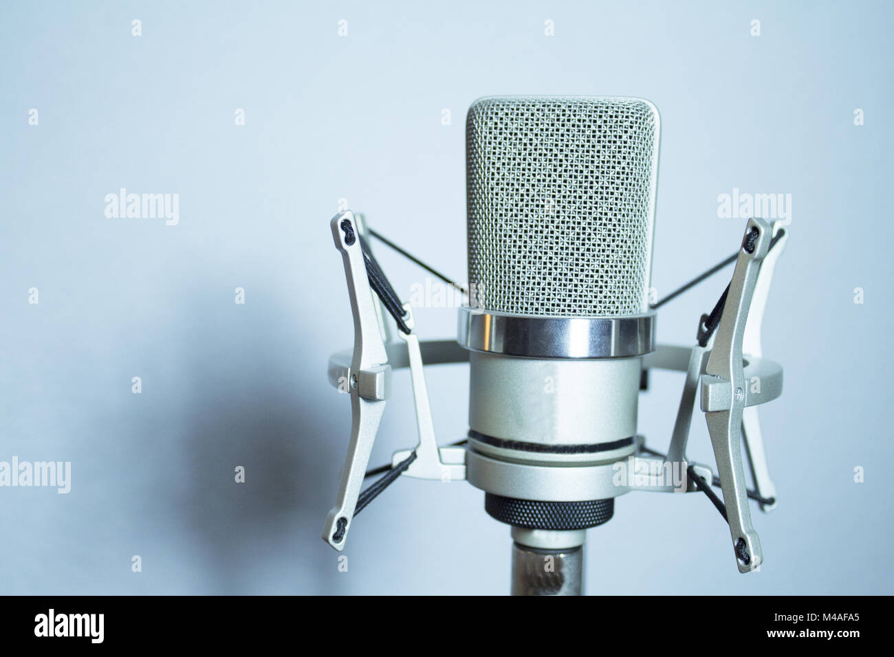 Professional microphone silver on white background Stock Photo - Alamy