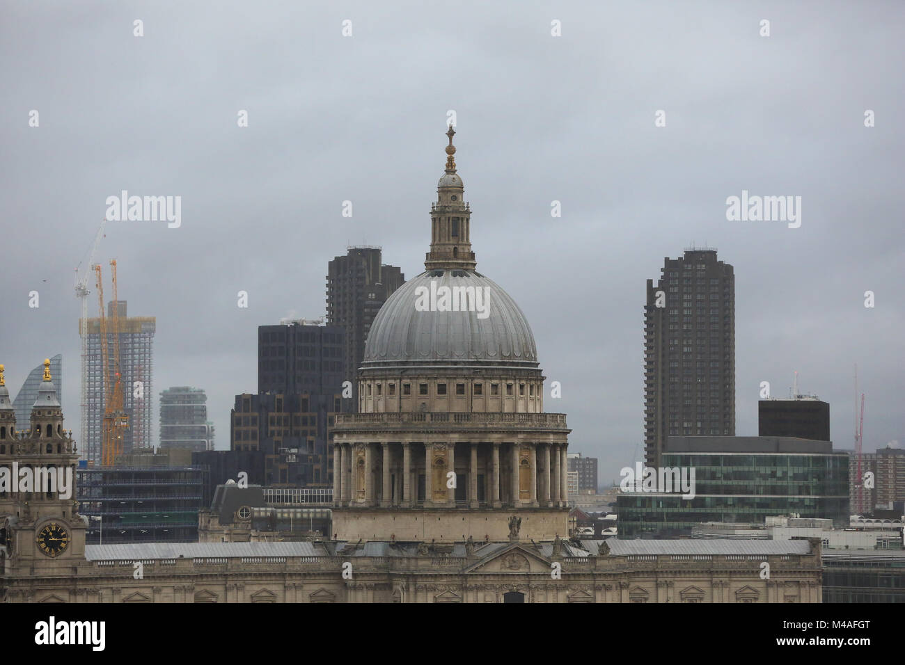 General view of iconic London buildings under a grey sky as heavy rain ...