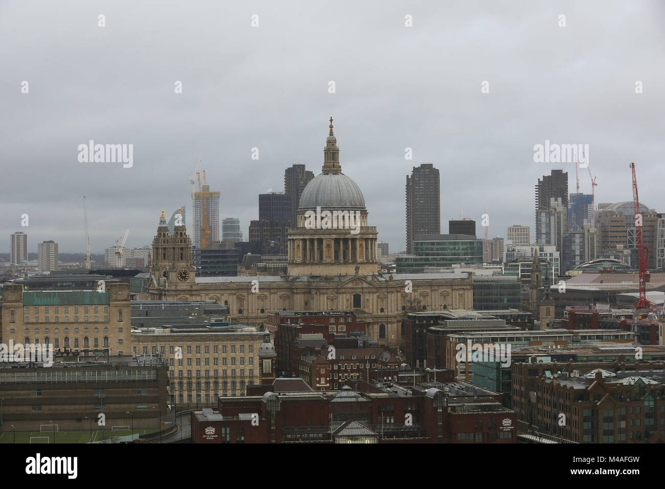 General view of iconic London buildings under a grey sky as heavy rain ...